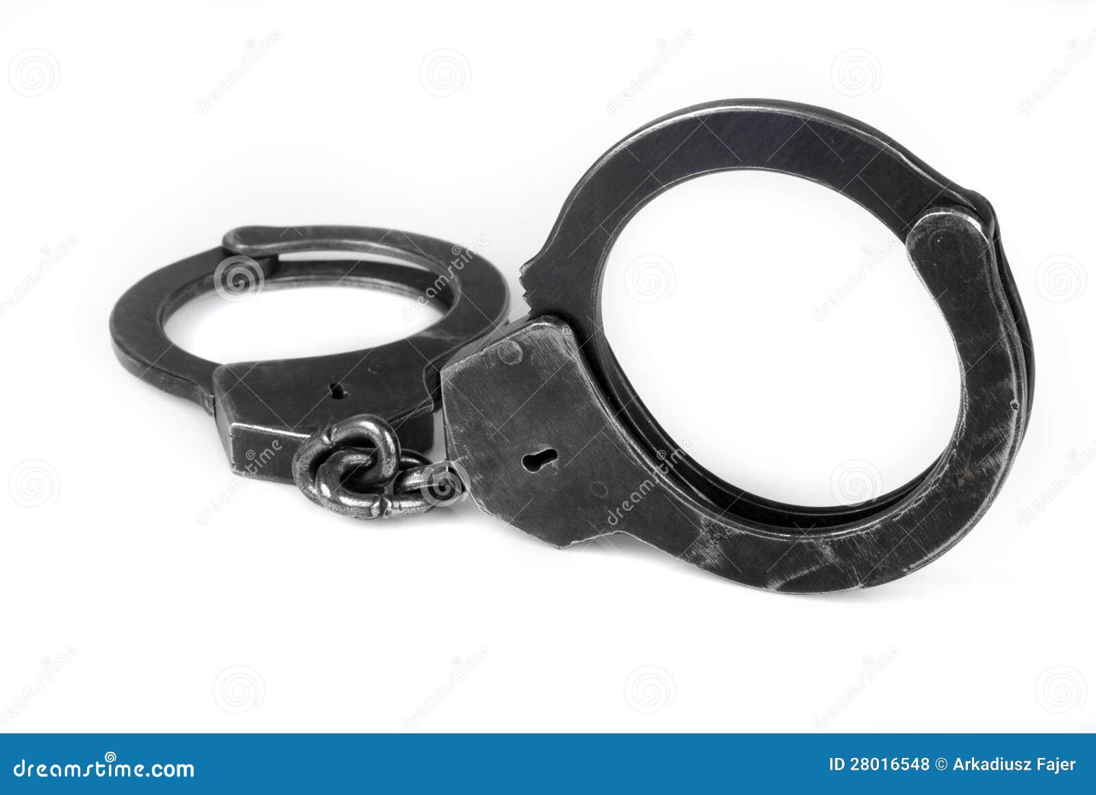 A Black Handcuff With A Brown Pistol Magazine In It With A Black 9mm ...