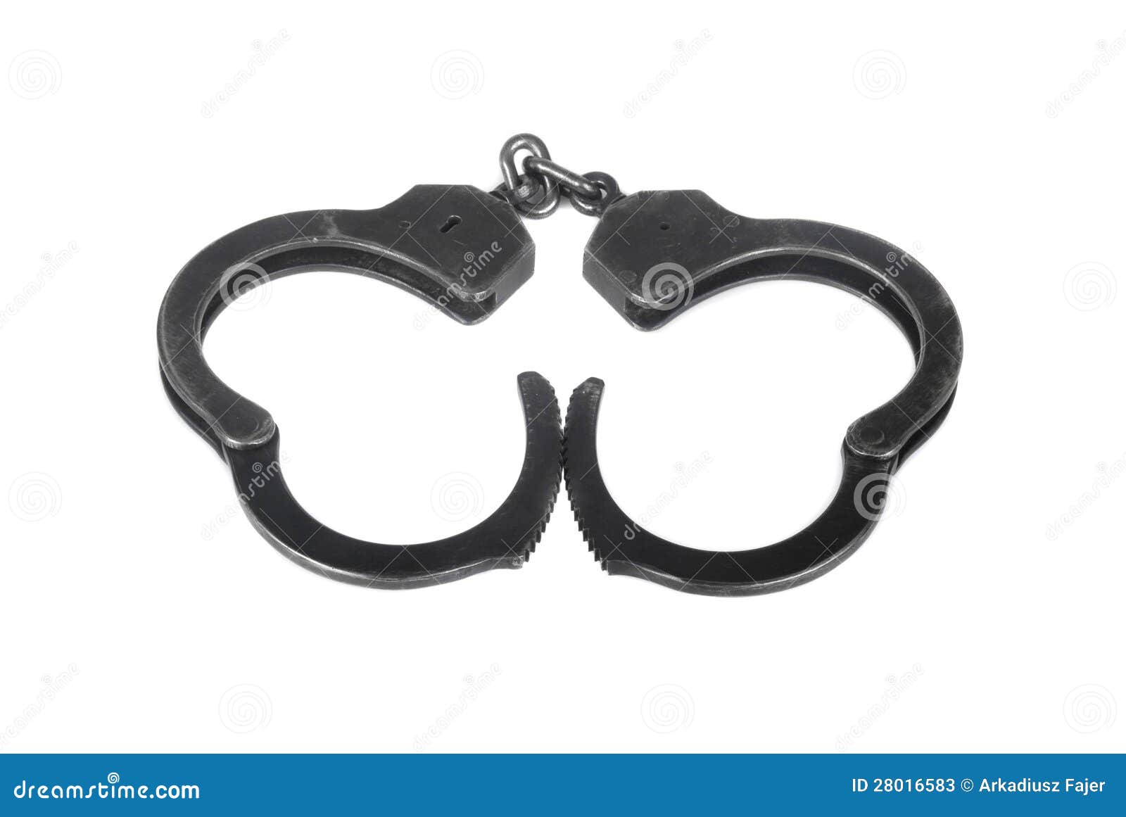 A Black Handcuff With A Brown Pistol Magazine In It With A Black 9mm ...