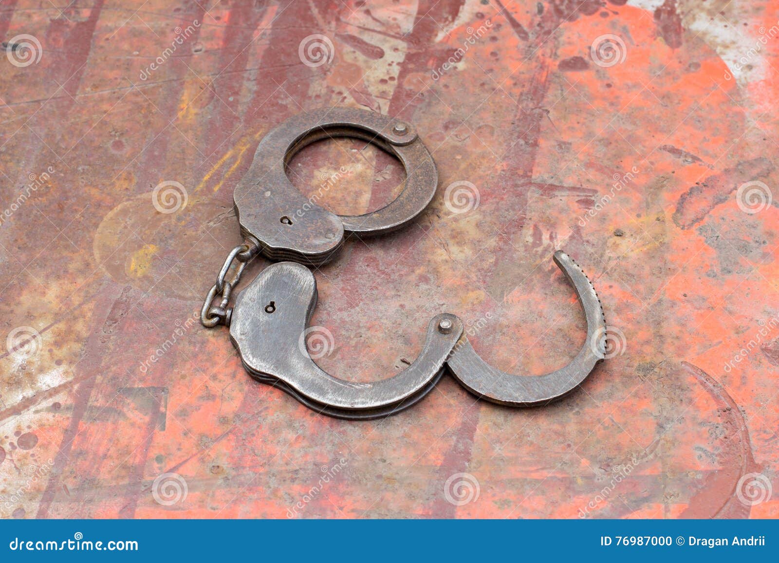 Old Handcuffs on the Table. Old Rusty Metal Stock Photo - Image of ...