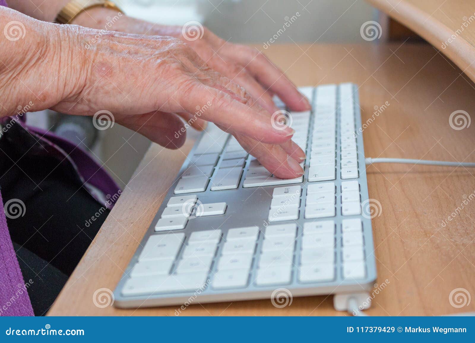 Old hands use a keyboard stock image. Image of people - 117379429