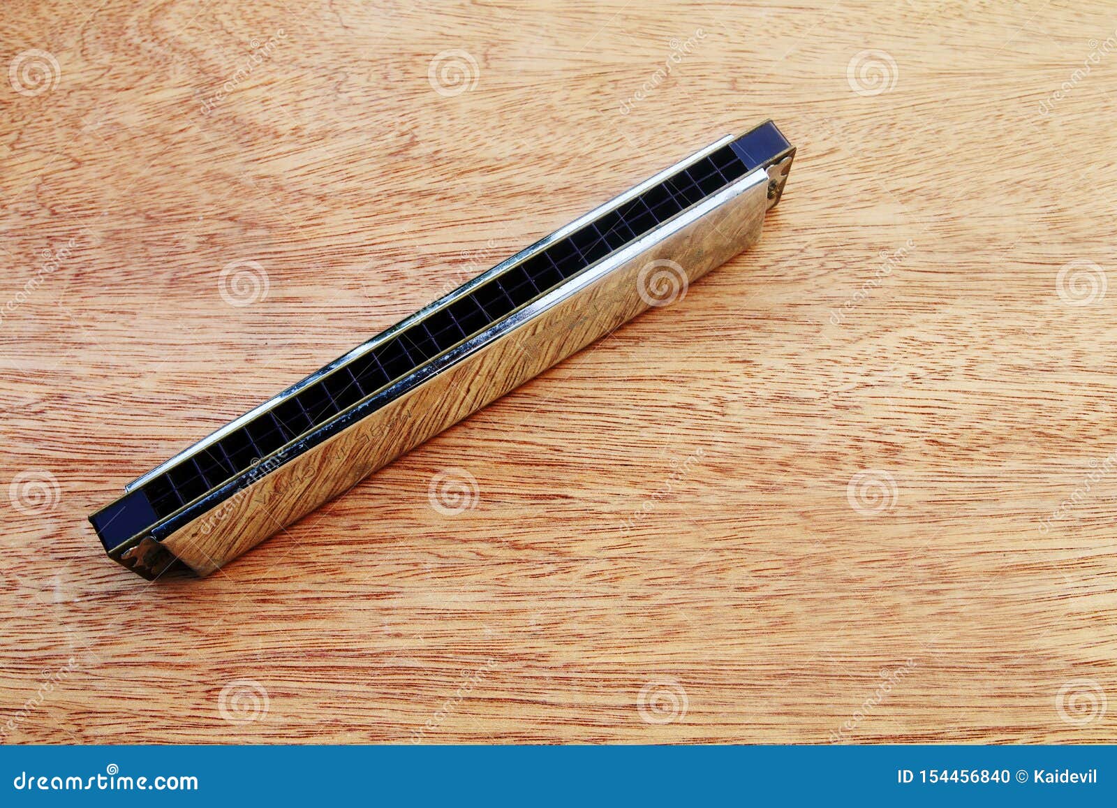 Old harmonica stock photo. Image of hand, antique, sound - 154456840