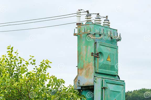 Old High Voltage Transformer and Power Line Stock Photo - Image of ...