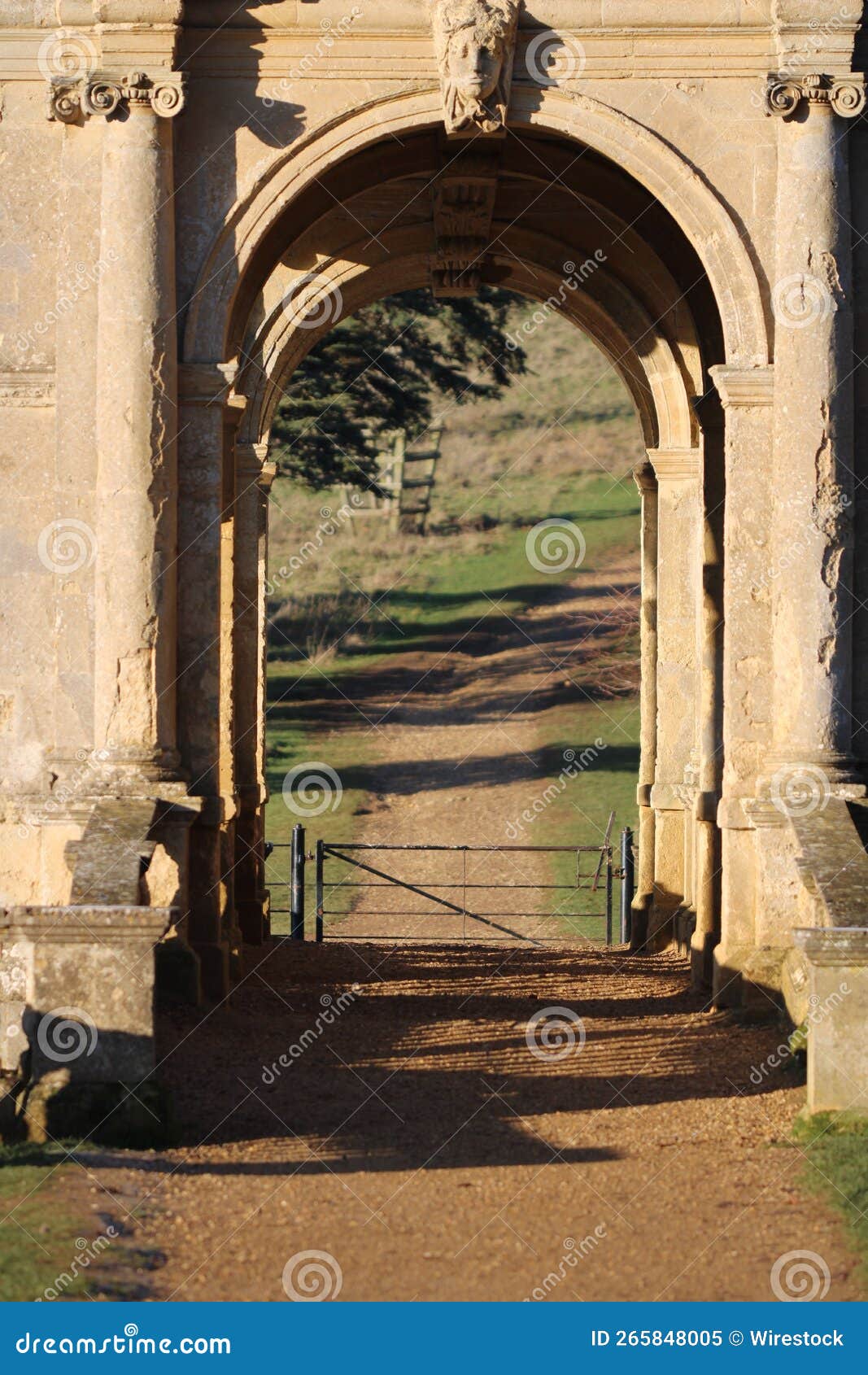 Old Historic Stone Arch with Columns Under Sunlight Stock Image - Image ...