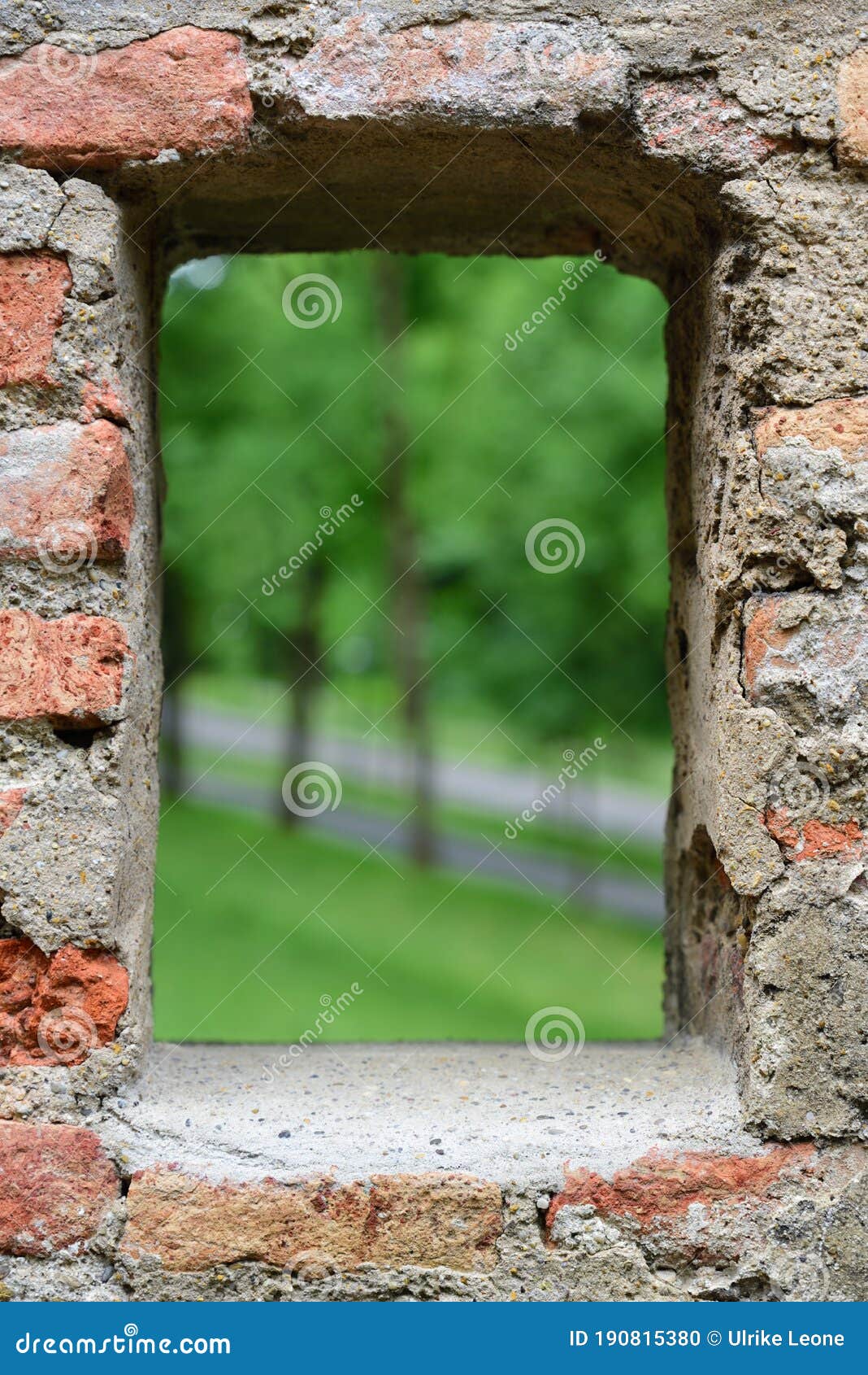 An Old Historical Stone Wall Forms the Frame Around an Opening that ...