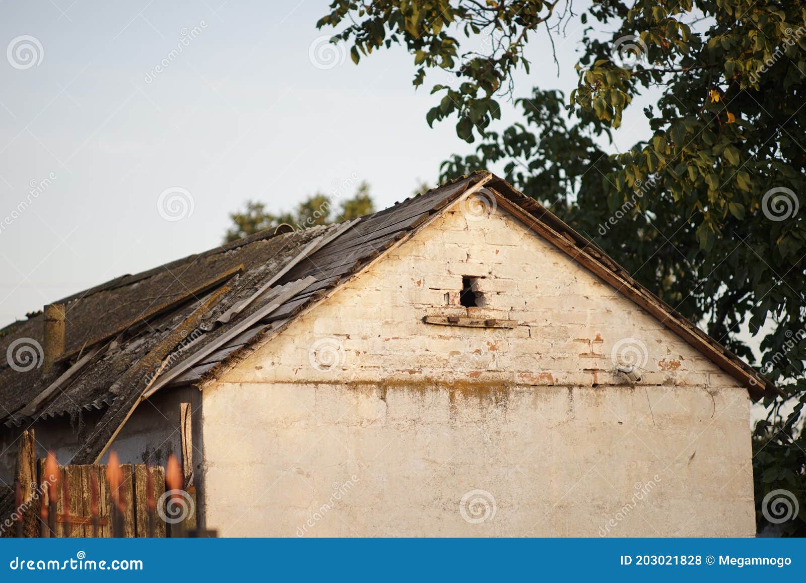 Old House with Destroyed Tiled Roof Under a Tree Stock Photo - Image of ...