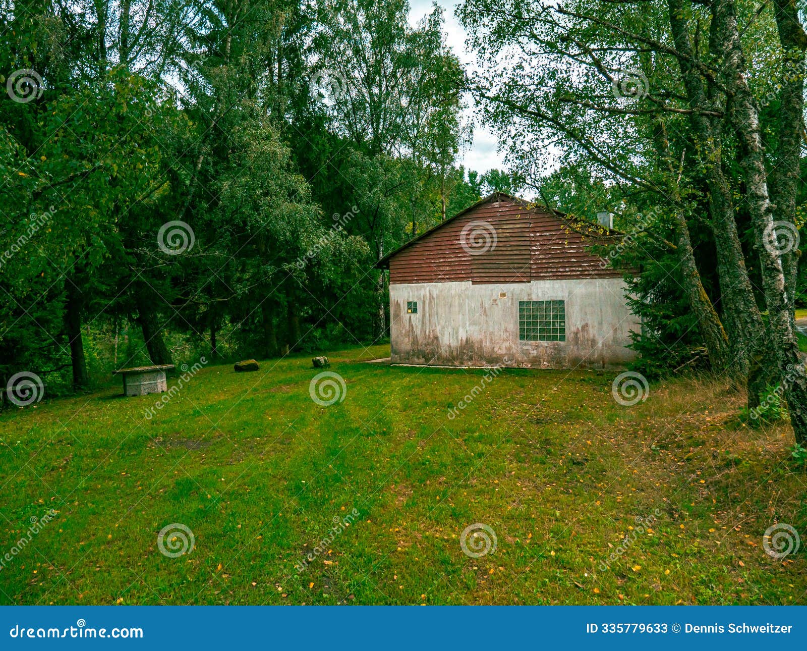 Old House in the Forest with Grass, Two Stones and a Stone Table Stock ...