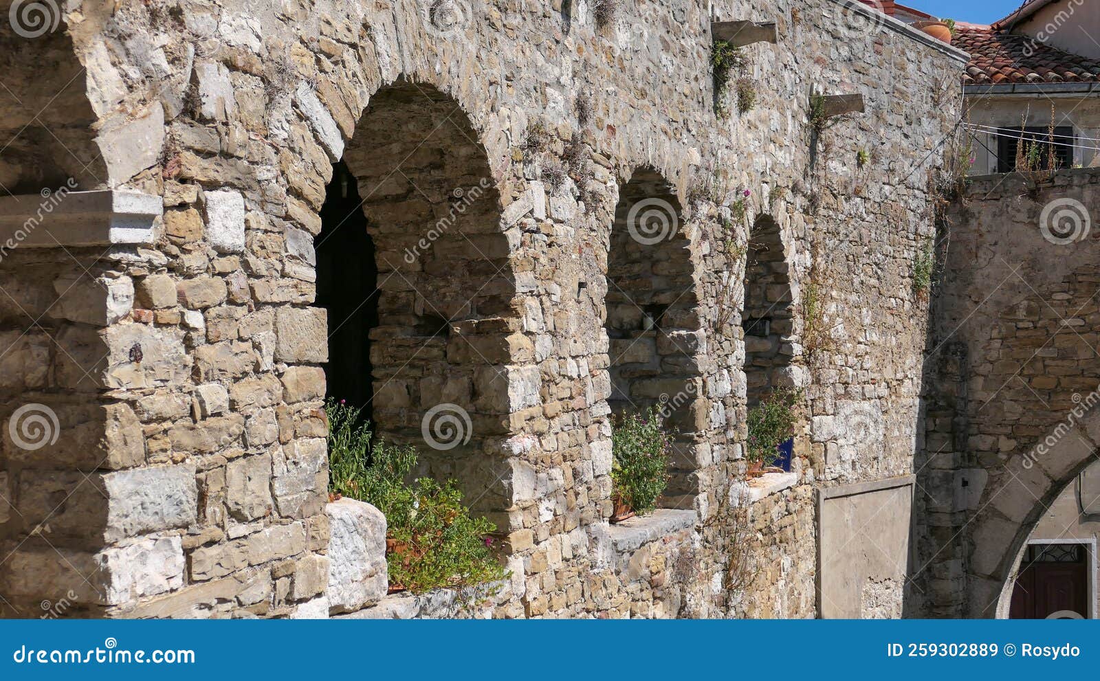 Old House Wall with Arched Windows in a Street Stock Image - Image of ...