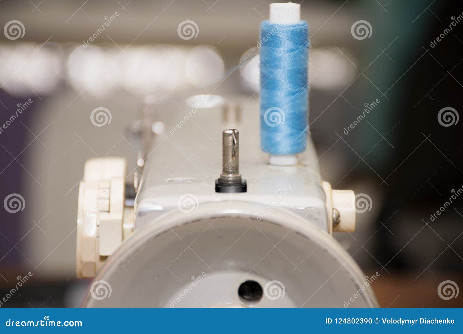 Old Household Sewing Machine with Reel of Blue Thread Stock Photo ...