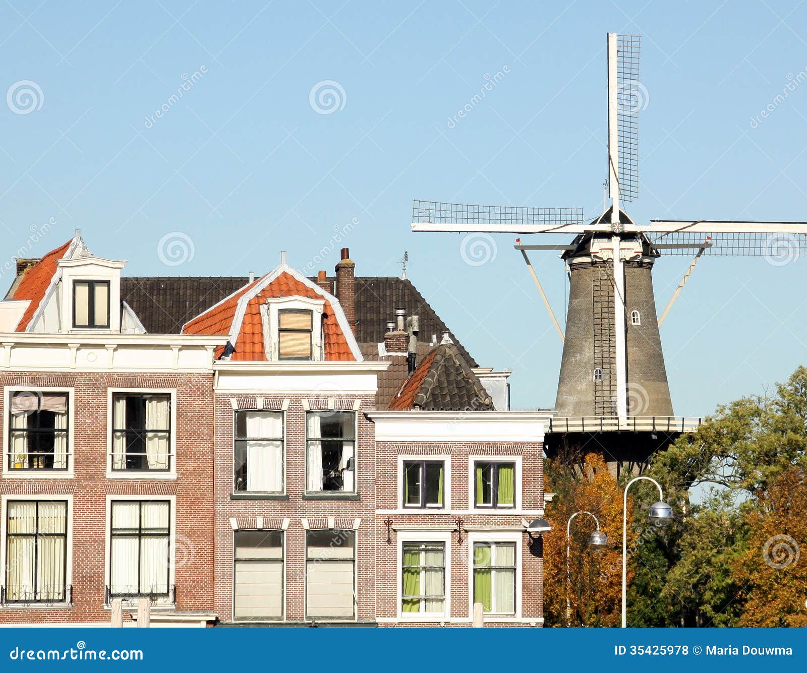 Old houses and windmill stock photo. Image of mill, holland - 35425978