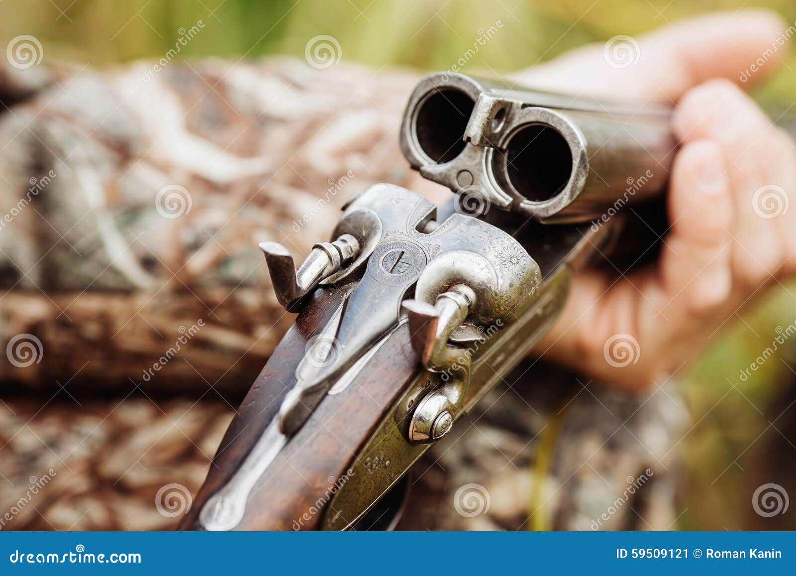 Old hunter loading his gun stock image. Image of safety - 59509121