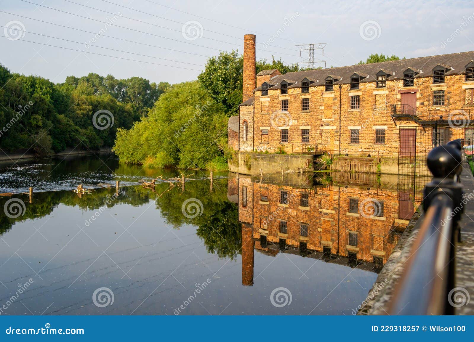 Old Industrial Mill Along a River Editorial Photography - Image of calm ...