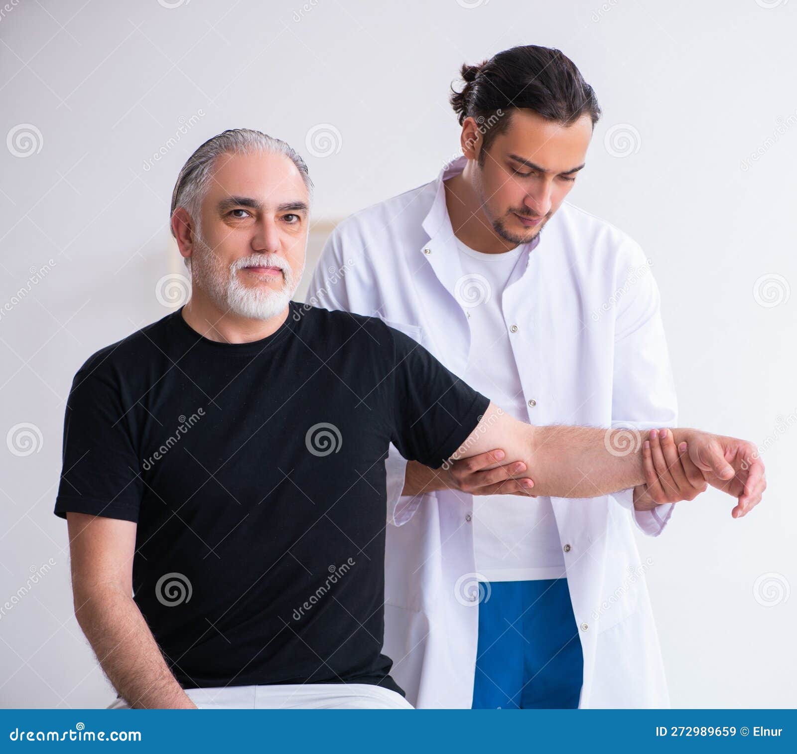 Old Injured Man Visiting Young Doctor Stock Image - Image of hospital ...