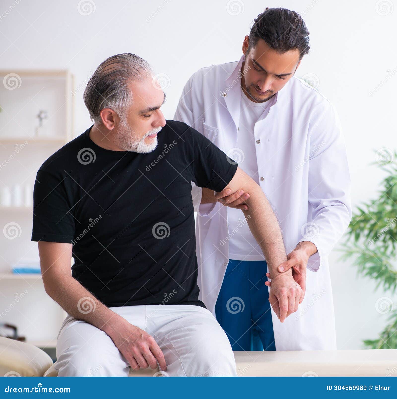Old Injured Man Visiting Young Doctor Stock Photo - Image of ligaments ...