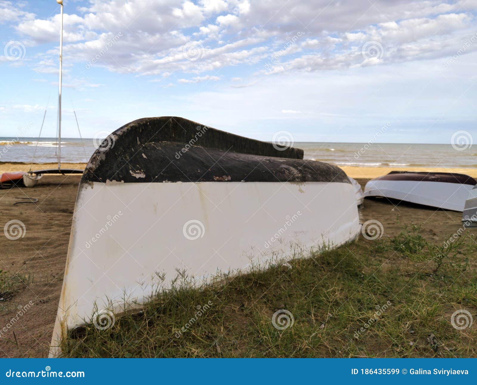 The Old Inverted Boat Lies on the Sea Shore Stock Image - Image of ...