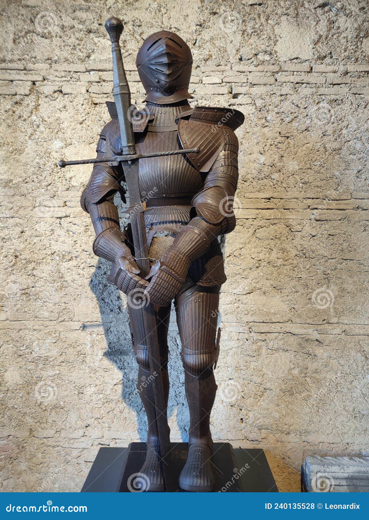 Old Iron Armor of Medieval Knight with a Big Sword Stock Photo - Image ...