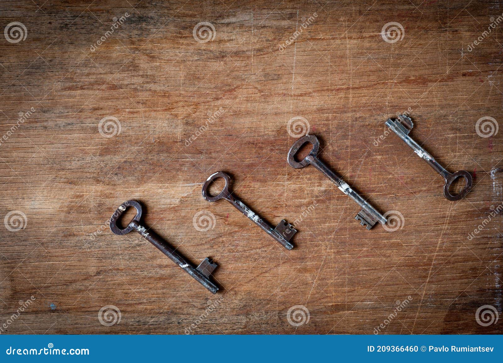 Old Iron Door Keys Lying on an Old Wooden Surface Stock Photo - Image ...