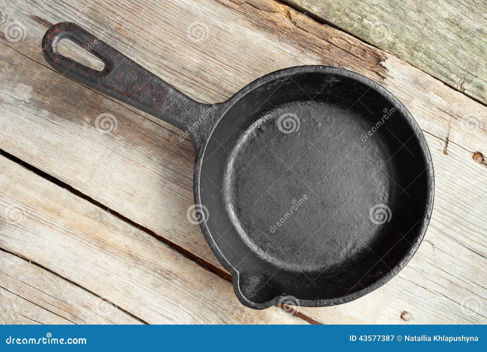 Old Iron Frying Pan on Wooden Rustic Table Stock Image - Image of plank ...