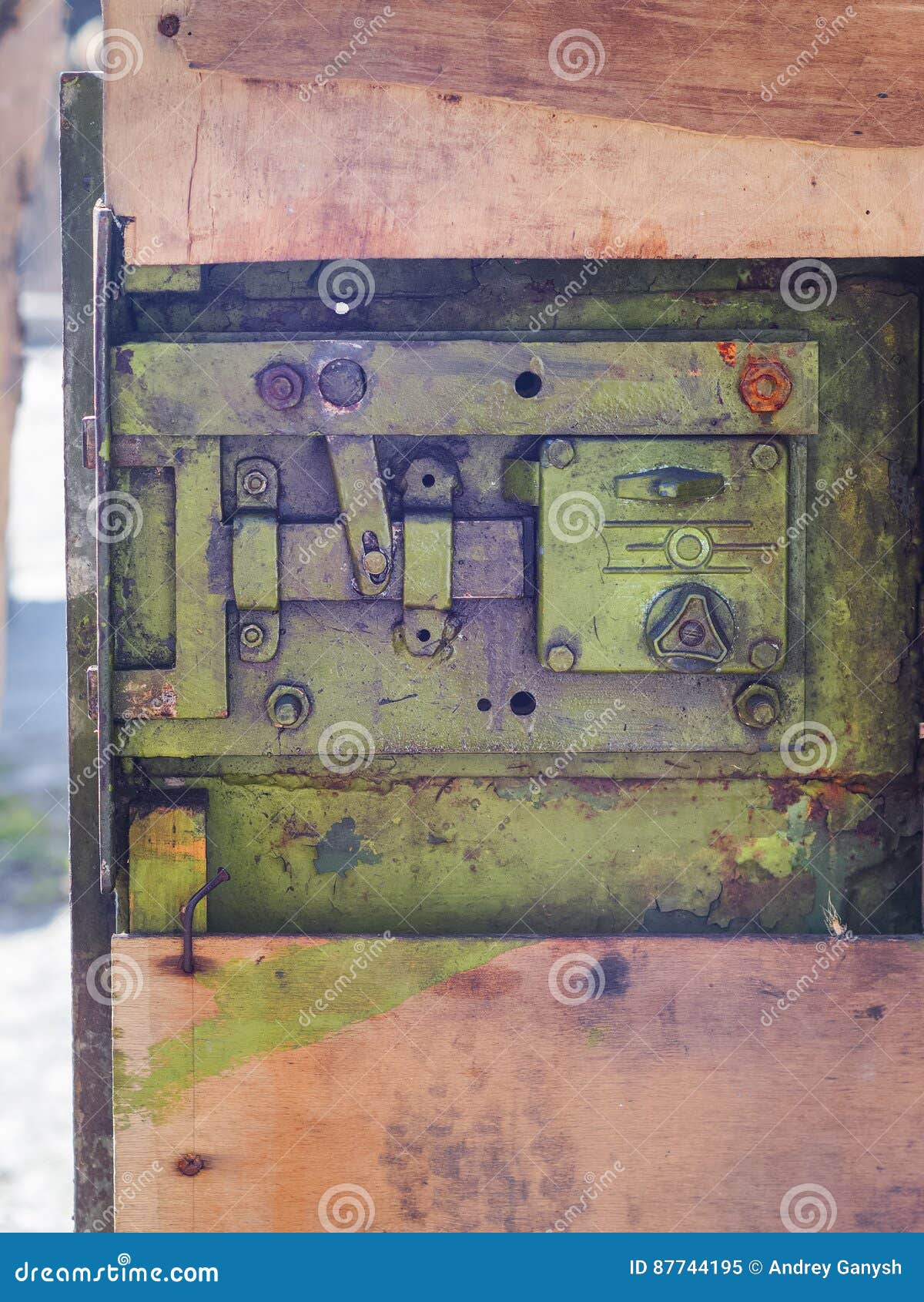 Old Iron Lock in a Metal Garage Door Stock Image - Image of closeup ...