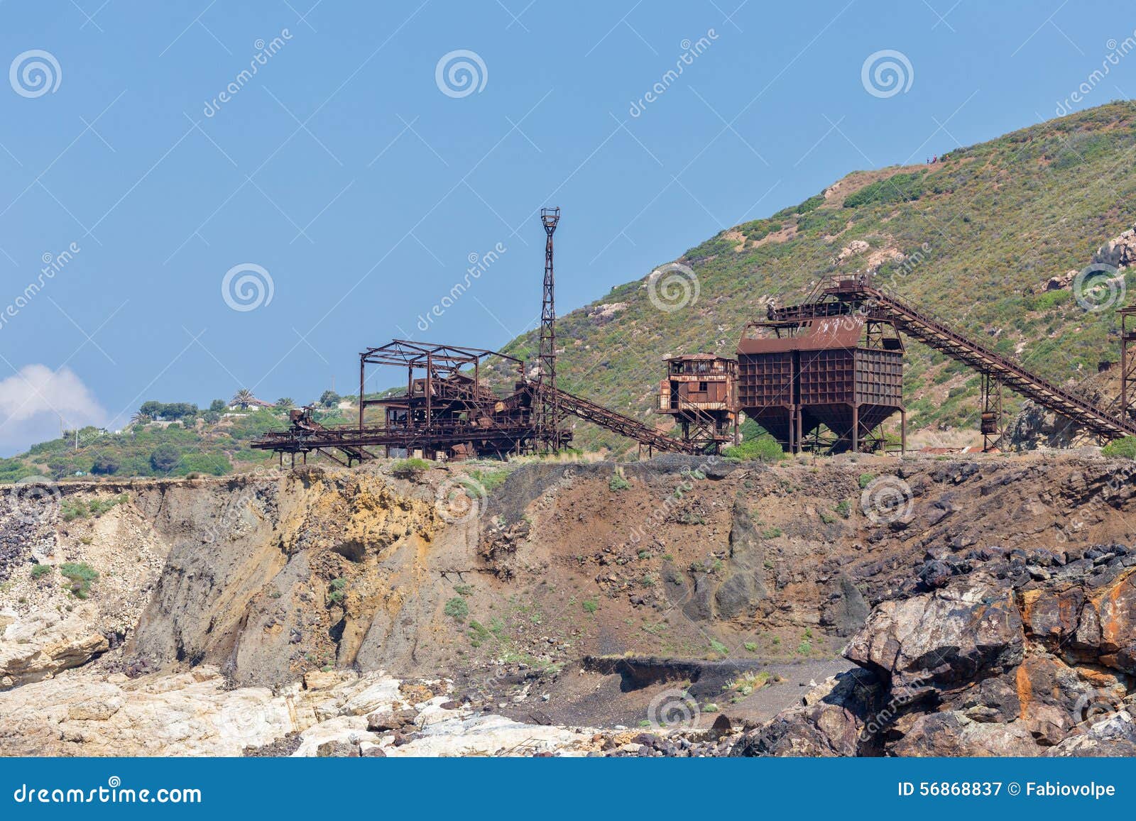 Old iron mine on the coast stock image. Image of camp - 56868837