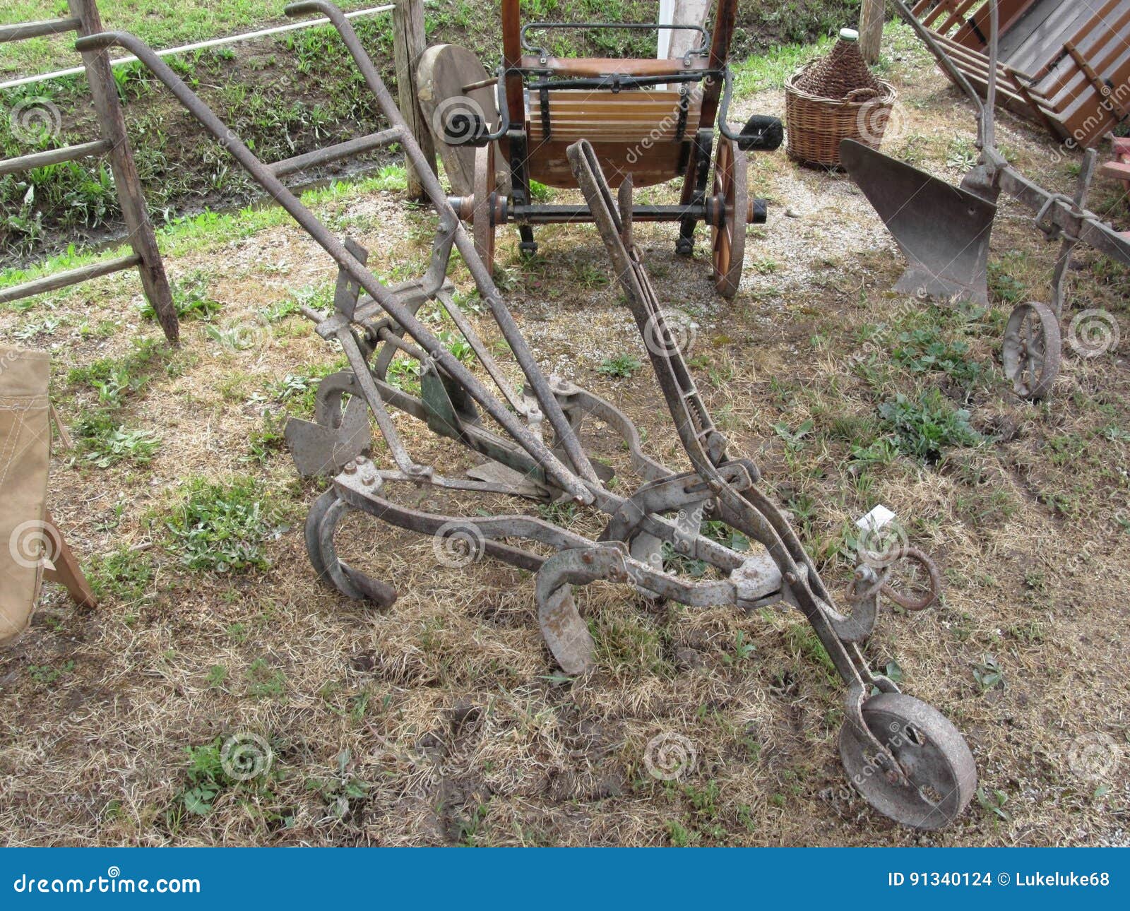 Old Iron Plow and Other Agricultural Tools Stock Photo - Image of ...