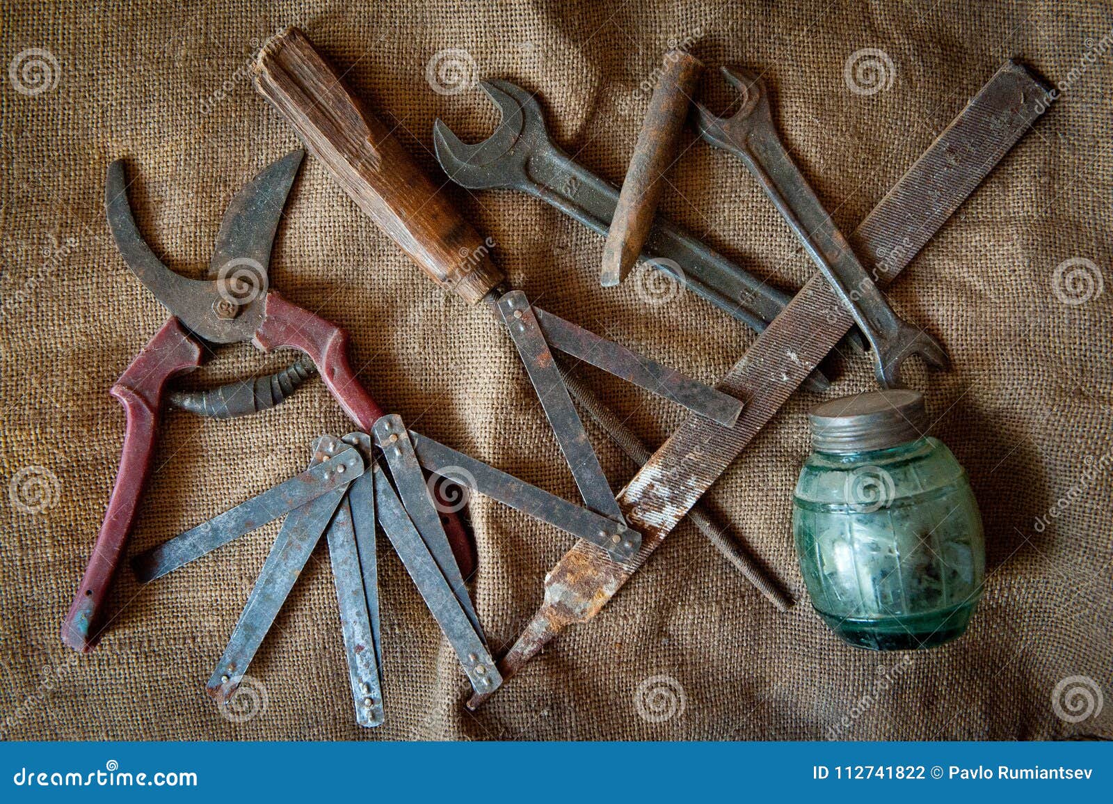 Old Iron Tools on the Background of Coarse Cloth Stock Photo - Image of ...