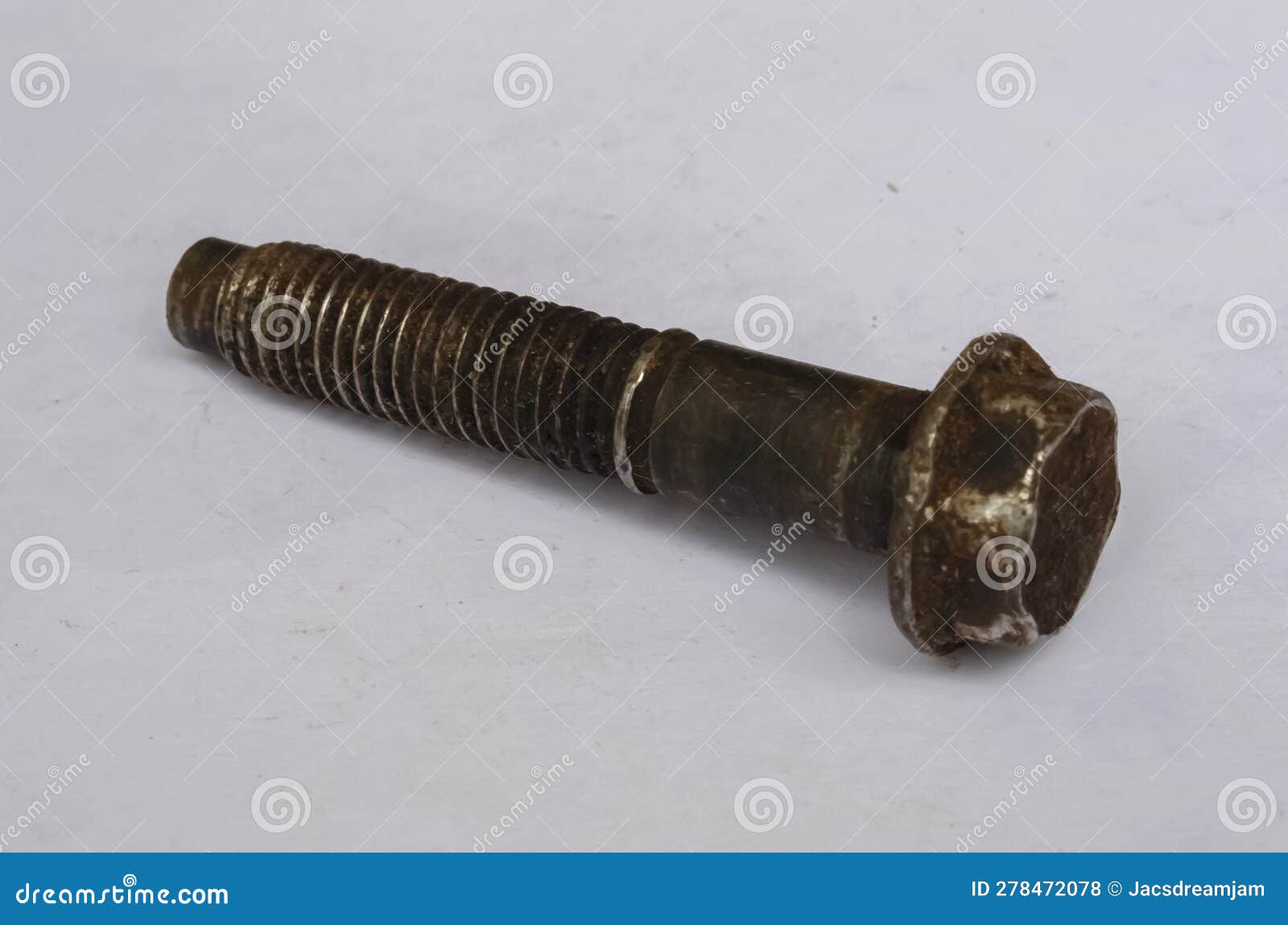 An Isolated Bolt on a White Surface Stock Photo - Image of dirty ...