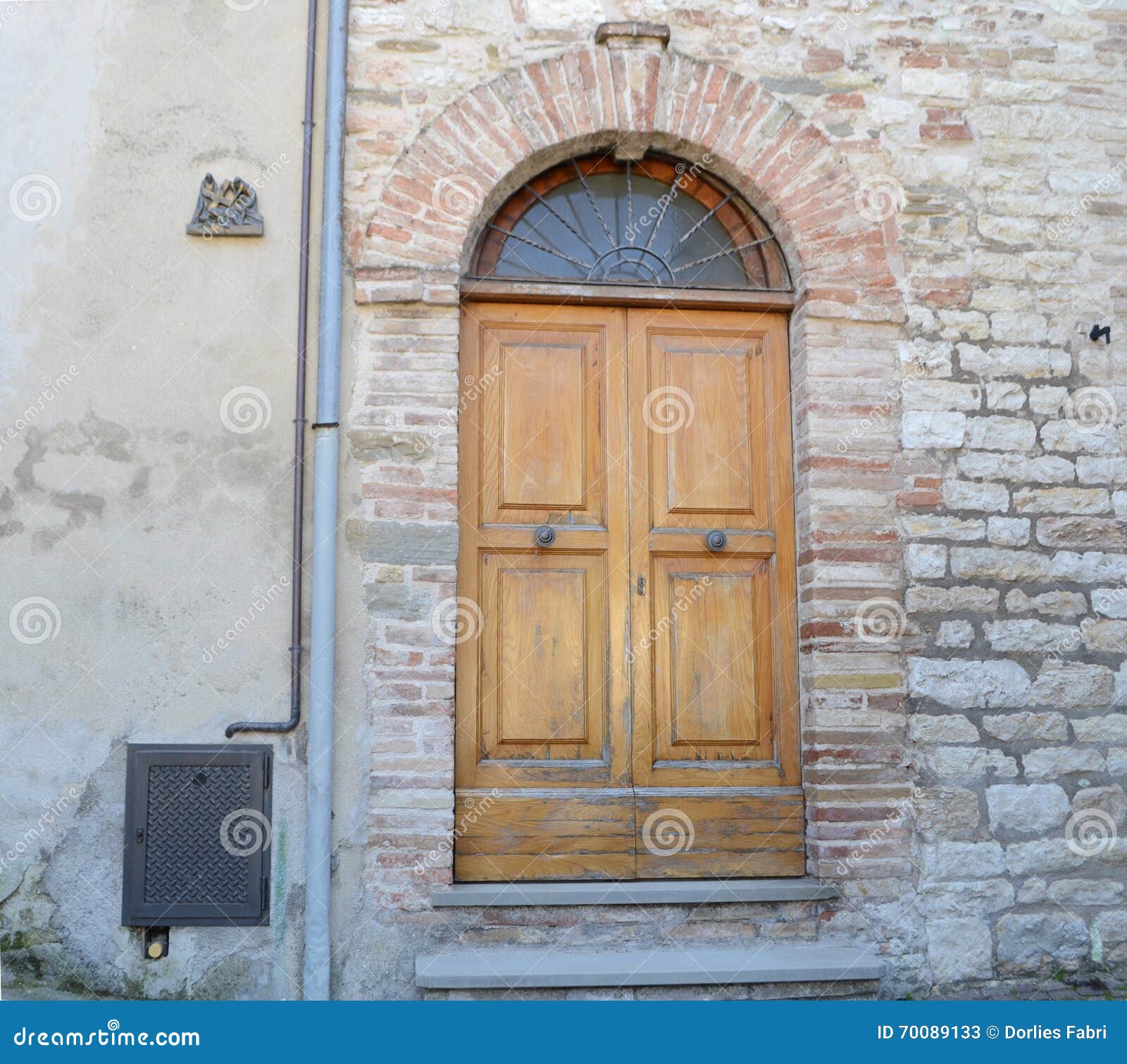 Old italian front door stock image. Image of brown, italian - 70089133