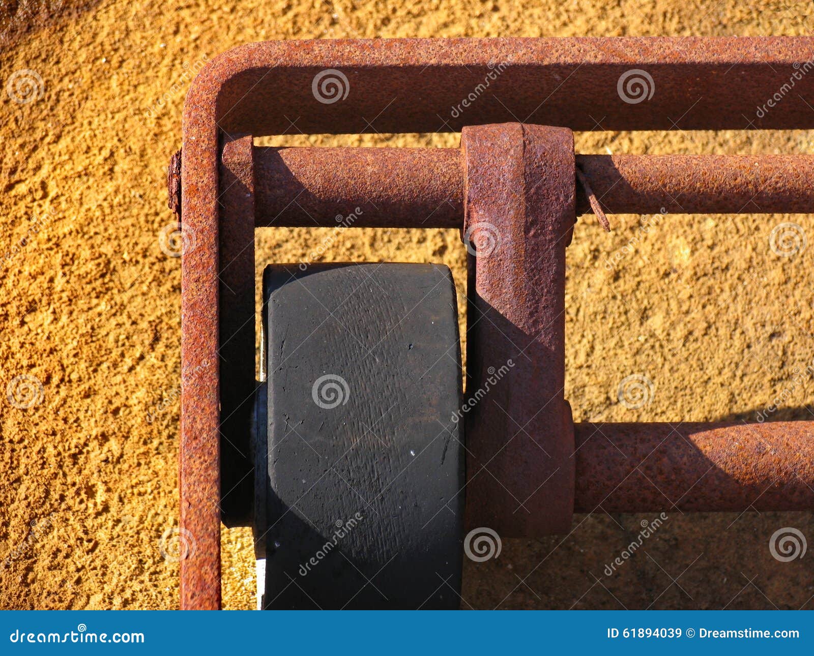 Red Rusty Jack Stand On A Table With Another Used Engine Part In A ...