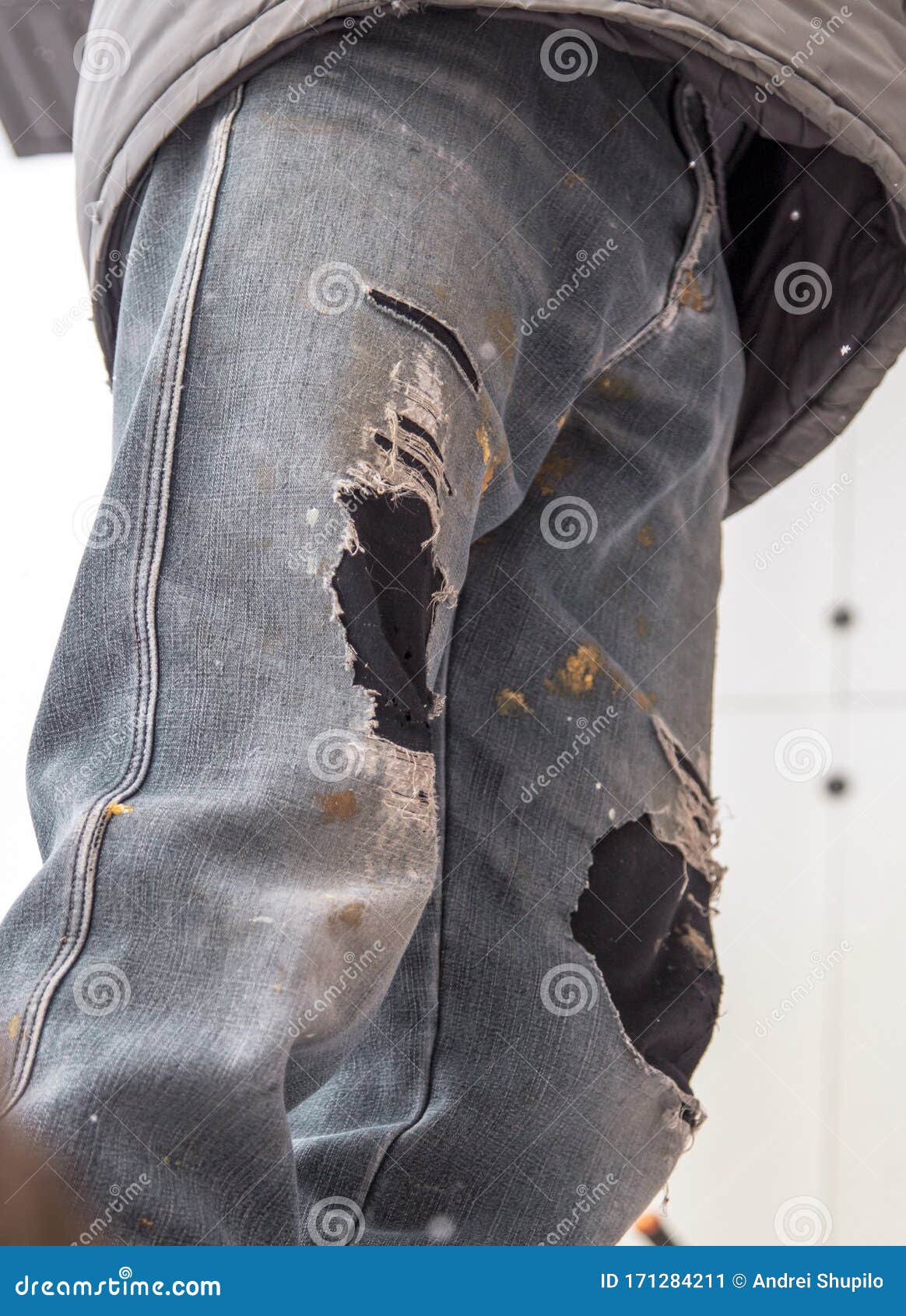 Old Jeans on a Construction Worker`s Legs Stock Image - Image of ...