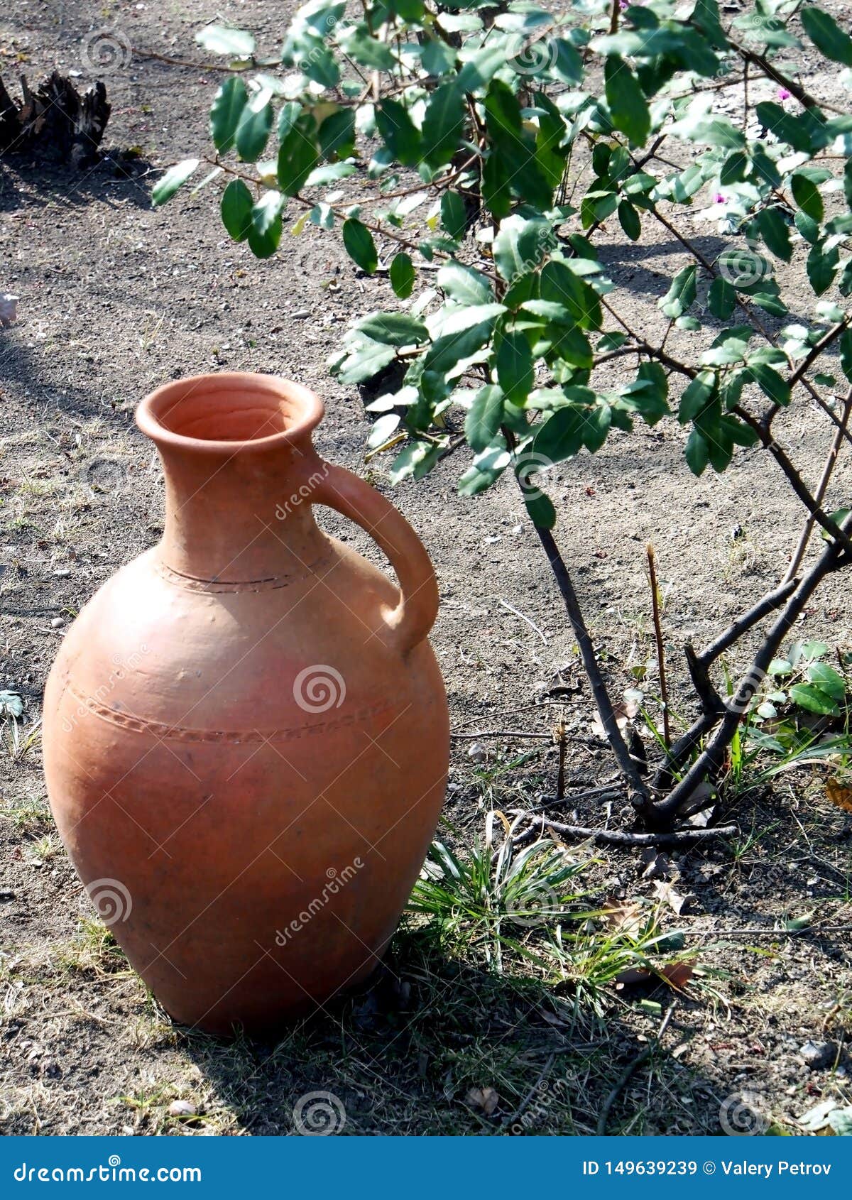 Old Jug on the Ground in the Yard of a Roadside Restaurant Stock Image ...