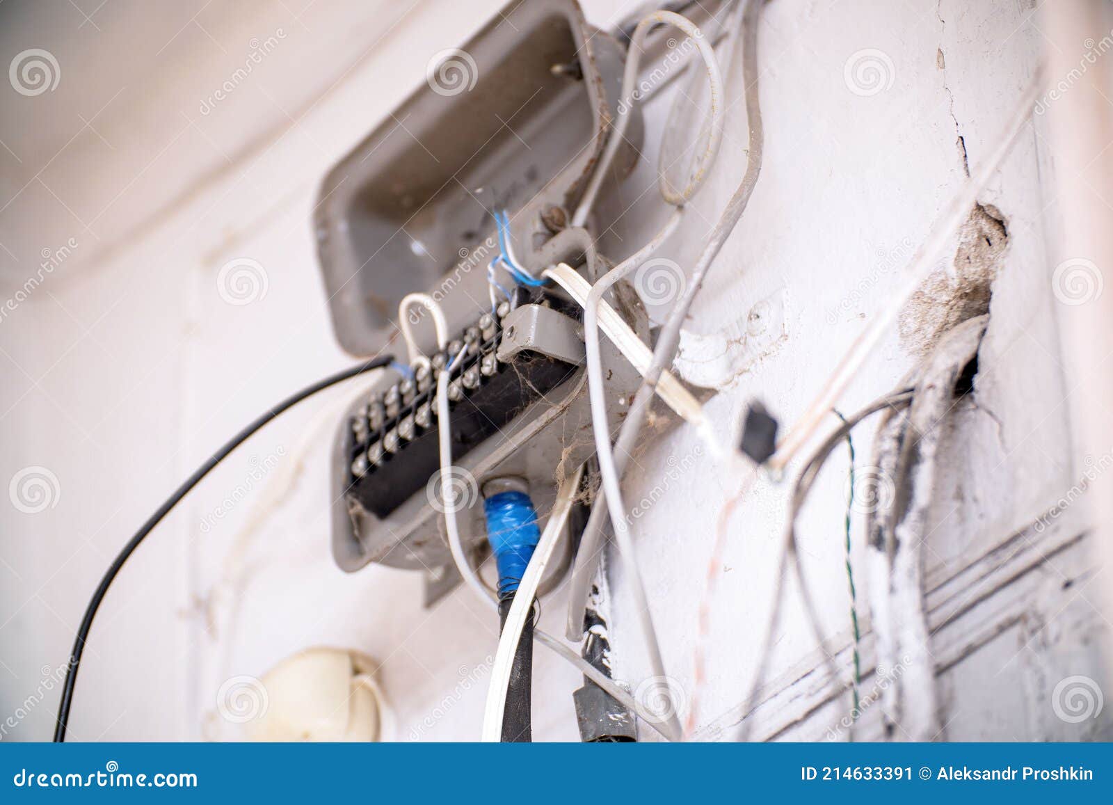 An Old Junction Box with Wires on a Light Wall Stock Image - Image of ...