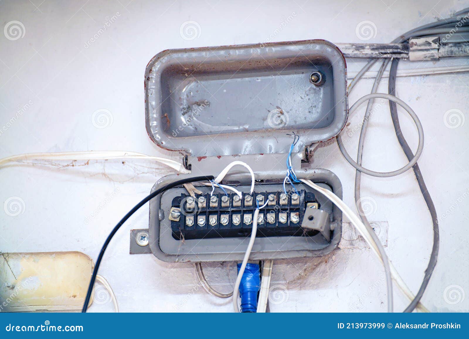 An Old Junction Box with Wires on a Light Wall Stock Image - Image of ...