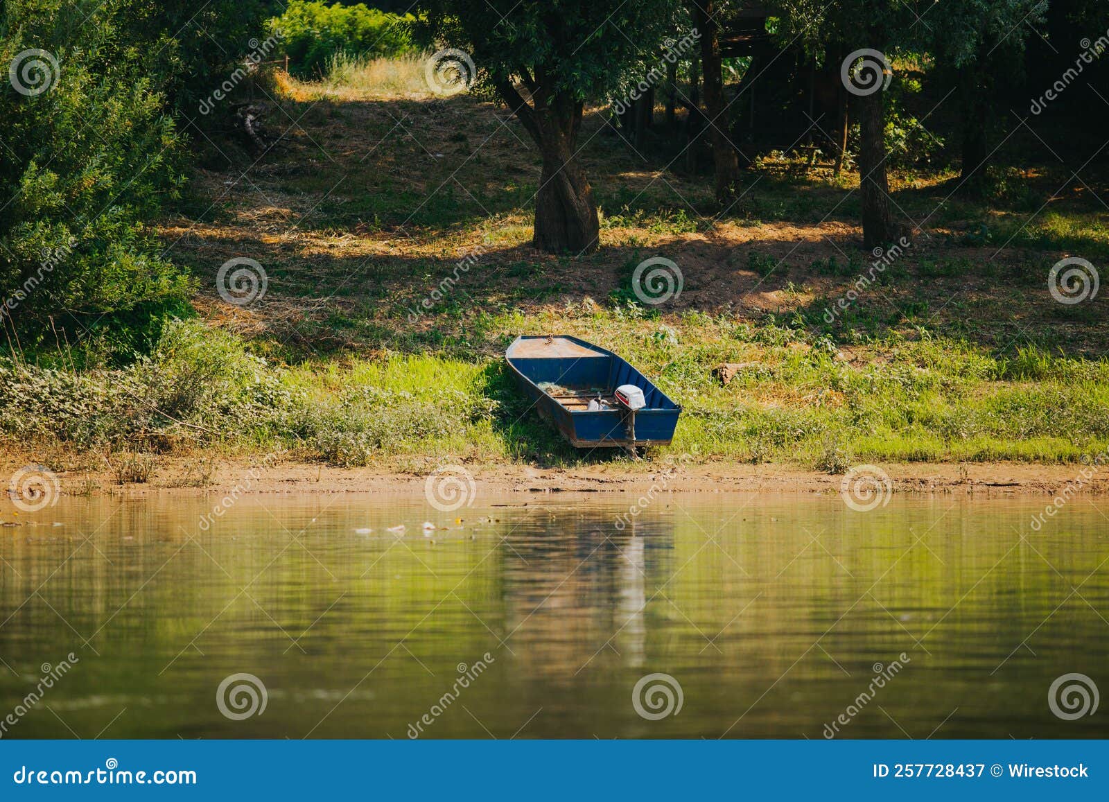 Old Kayak Parked on a Coast with Green Trees Stock Image - Image of ...