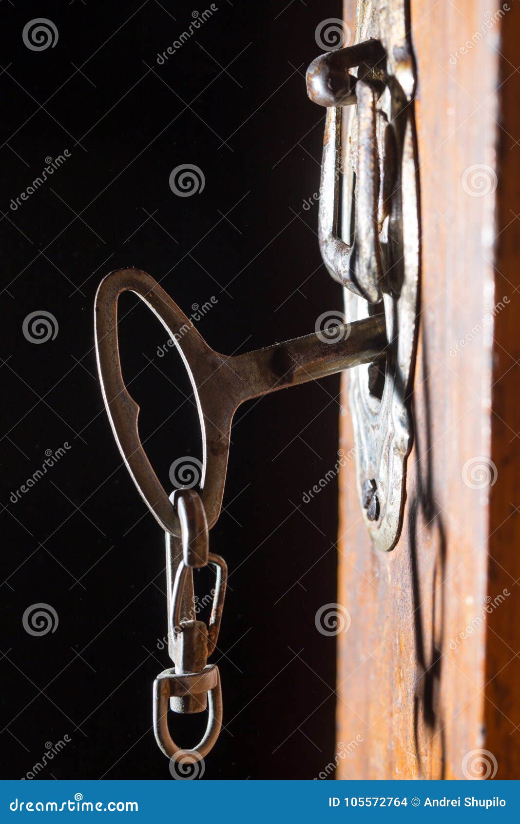 Old key in the door stock photo. Image of steel, concept - 105572764