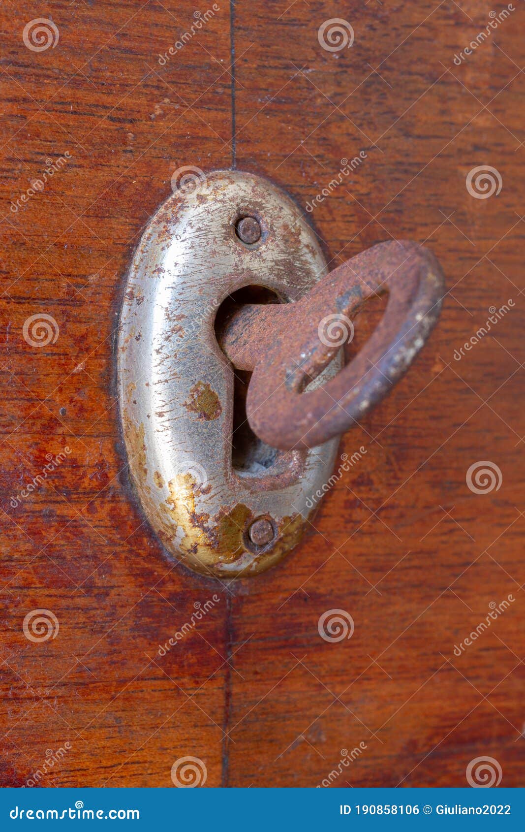 Old key in a keyhole stock photo. Image of unlock, weathered - 190858106