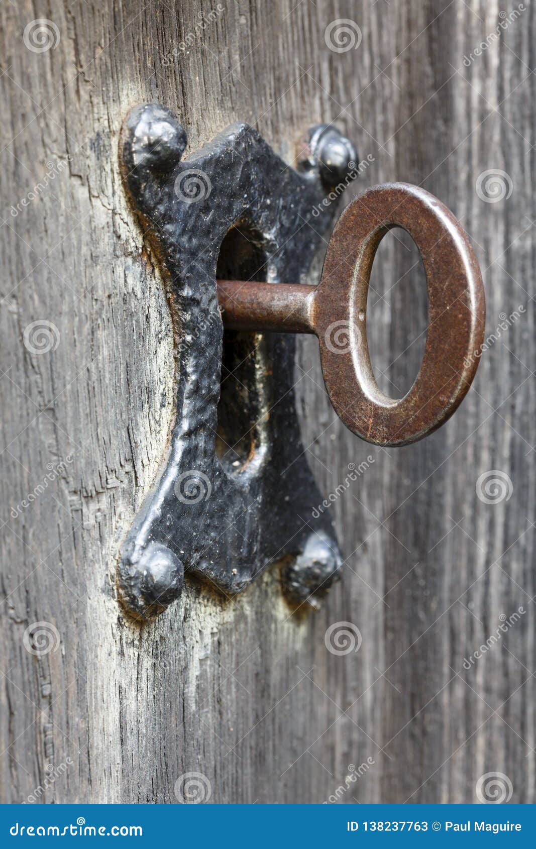 Key in keyhole detail stock image. Image of locksmithing - 138237763