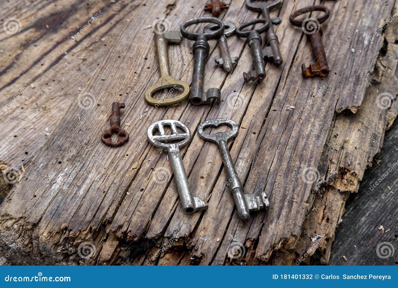 Old Keys of Different Sizes on Rustic Weathered Wood Planks Stock Photo ...