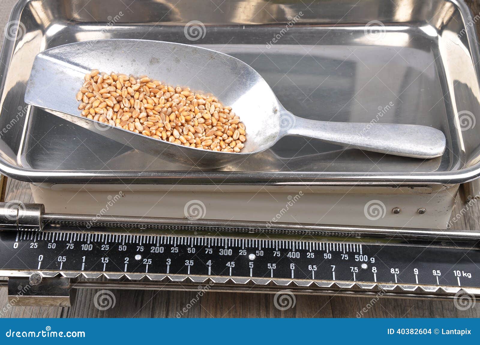 Old kitchen scales on wood stock photo. Image of measuring - 40382604