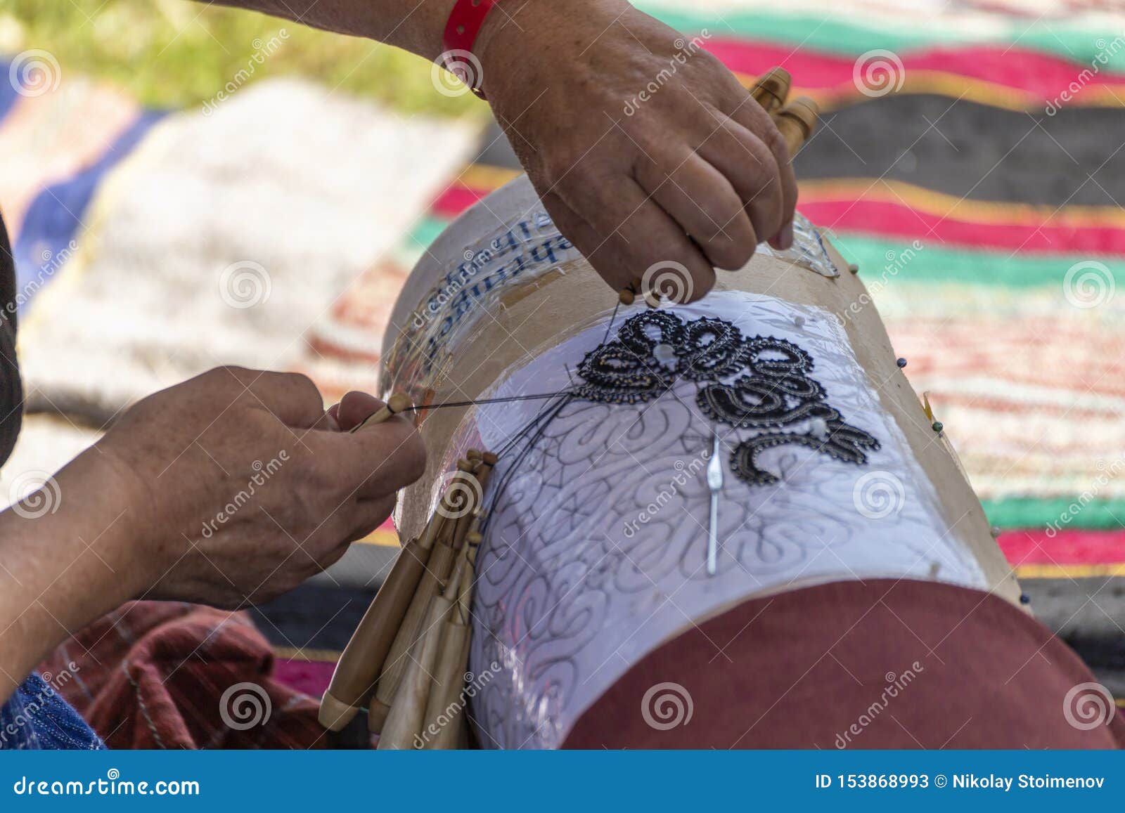 Knitting with Wooden Sticks on a Template Stock Image - Image of craft ...