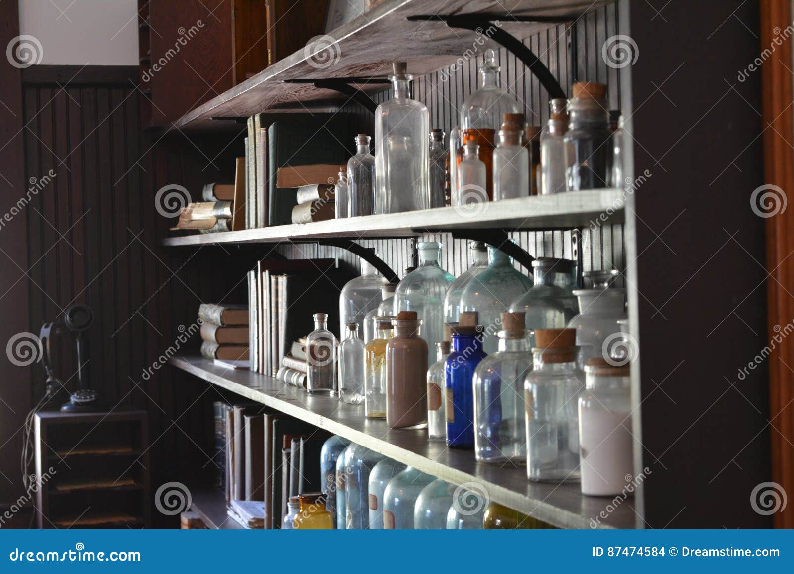 Old Lab and Bottles on a Shelf Stock Photo - Image of night, stormy ...