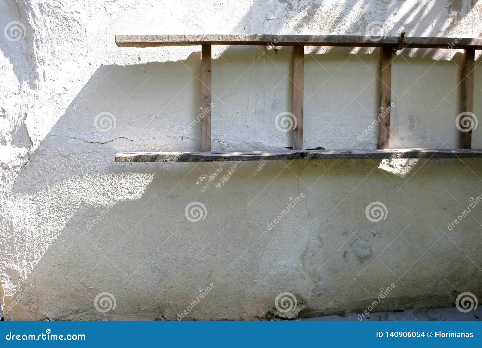 Old Ladder Hanging on White Wall of a Rustic Coun Tryhouse with Shadow ...