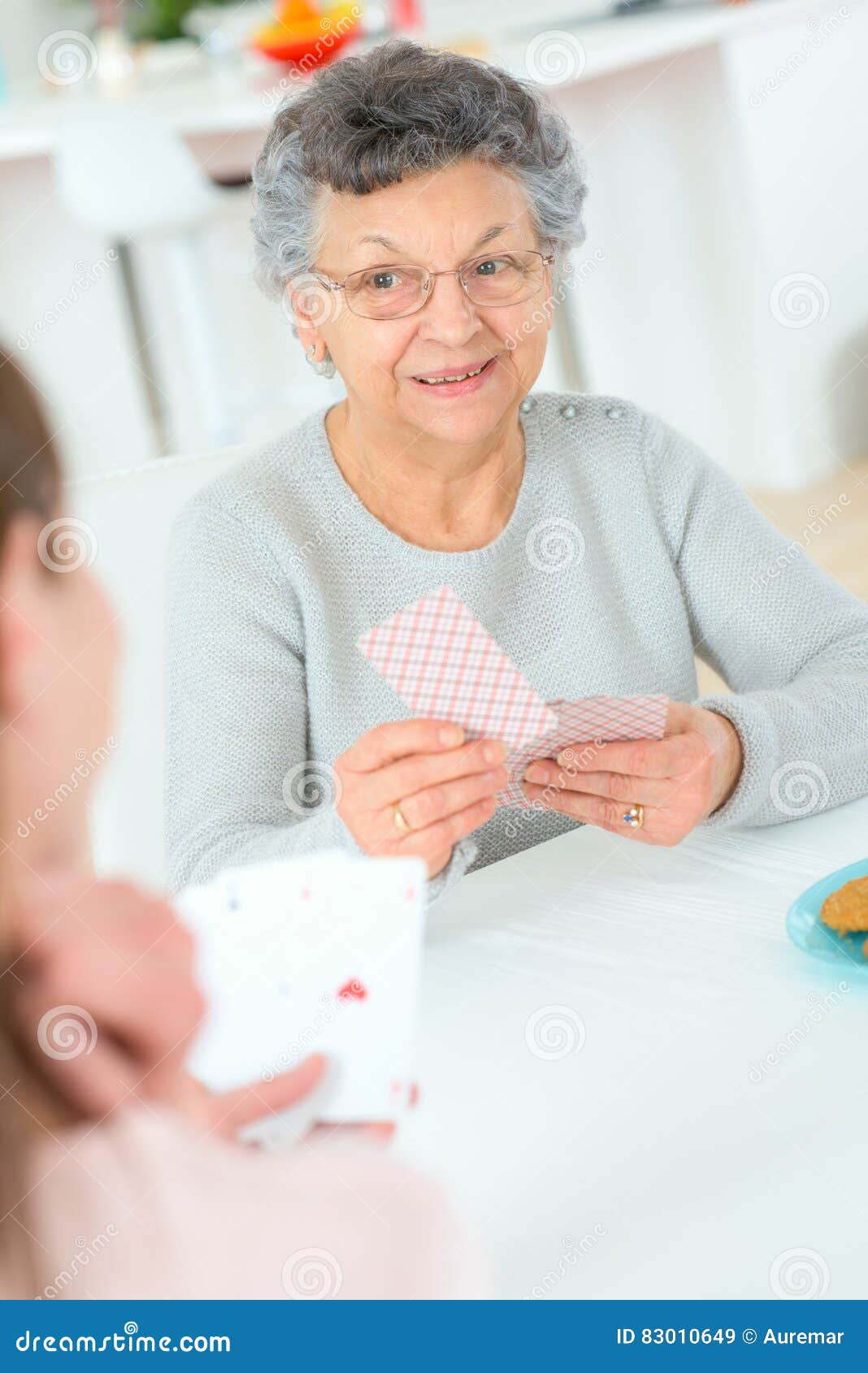 Old lady playing card game stock image. Image of elder - 83010649