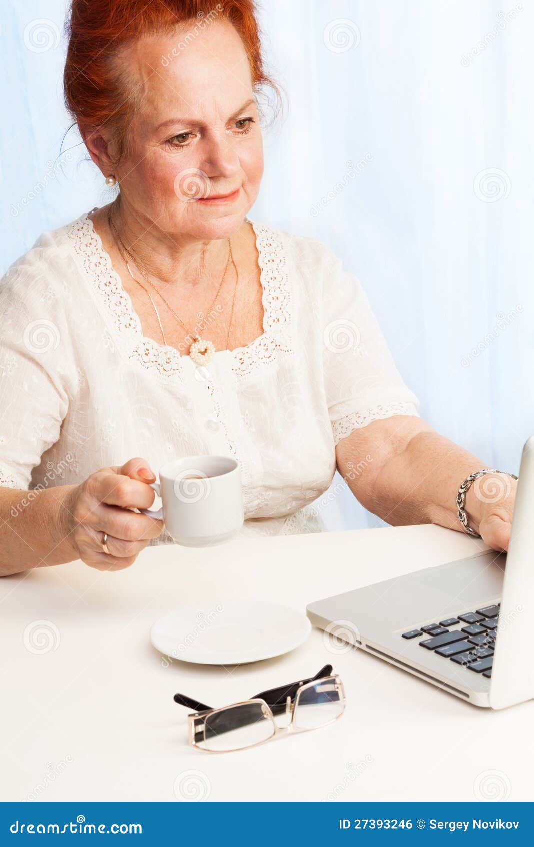Old lady reading her email stock photo. Image of aged - 27393246