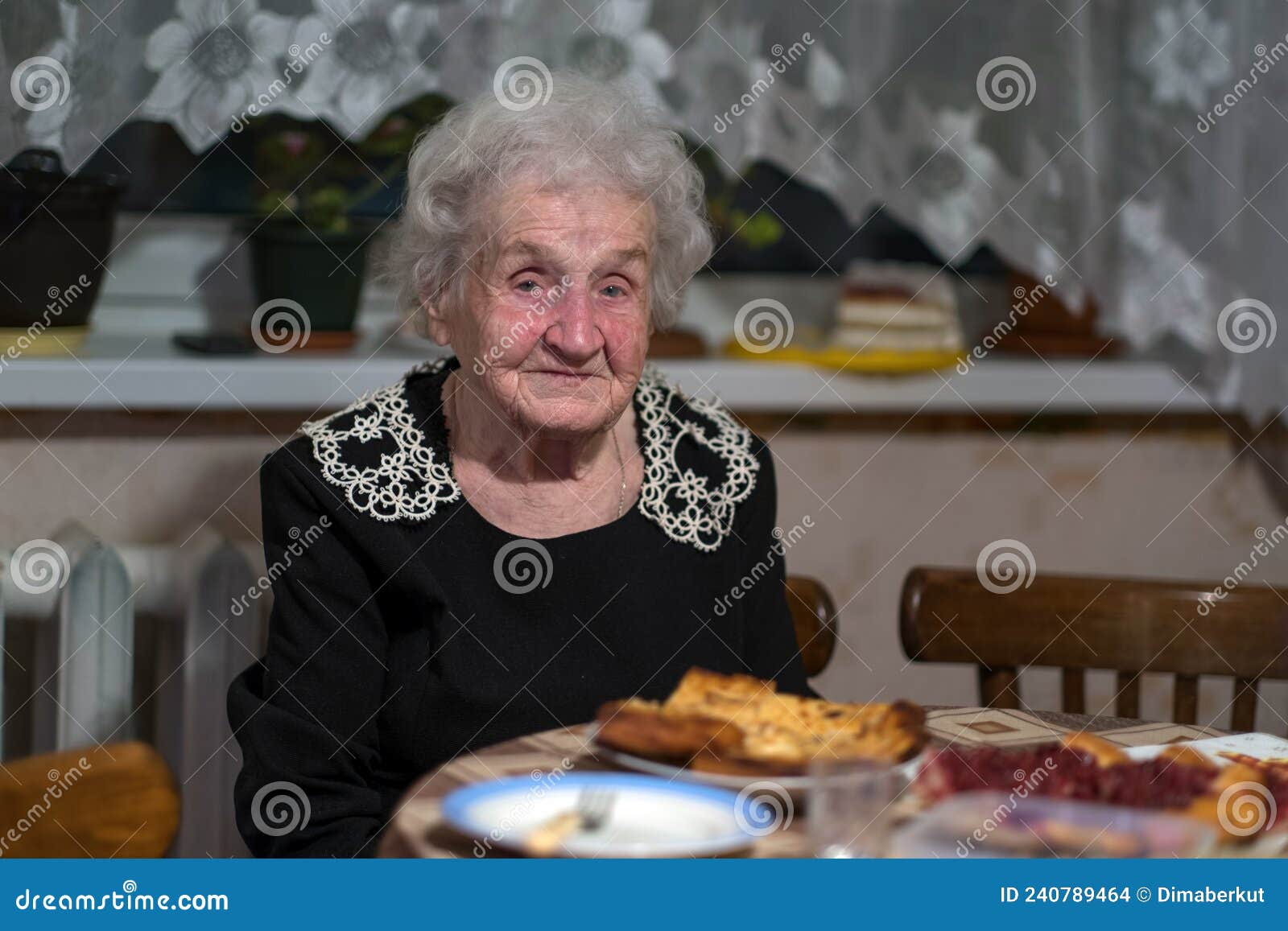 An Old Lady Sits at the Dinner Table. Stock Photo - Image of healthy ...