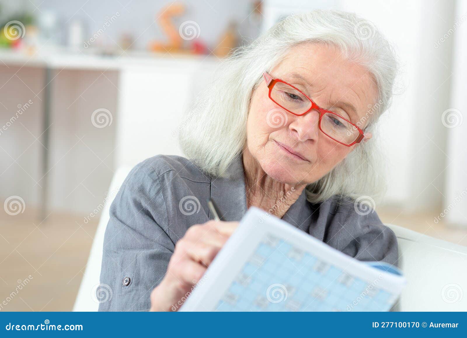 Old lady taking notes stock photo. Image of elderly - 277100170