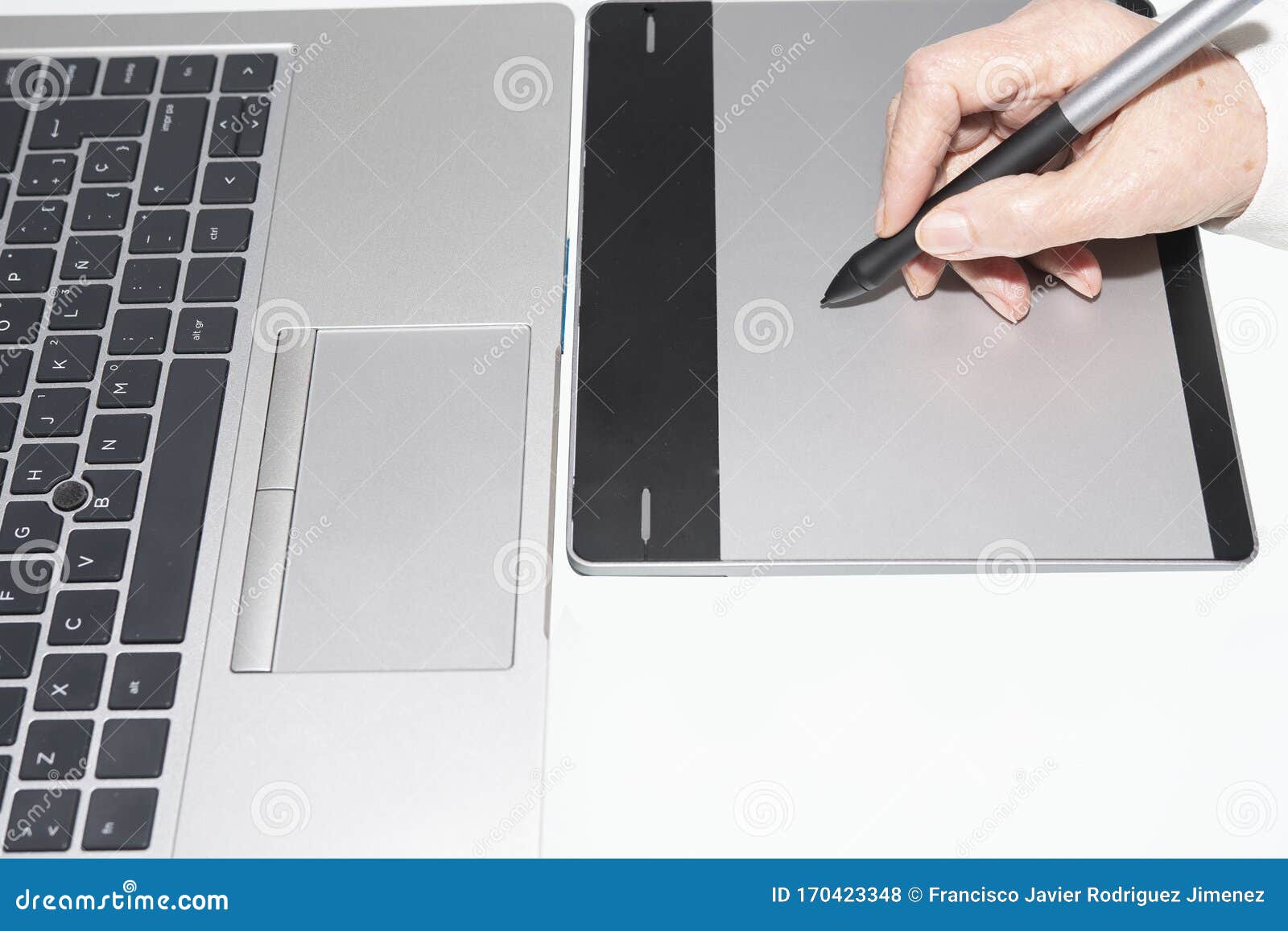Old Lady Using Drawing on a Graphic Tablet on a White Table Stock Photo ...