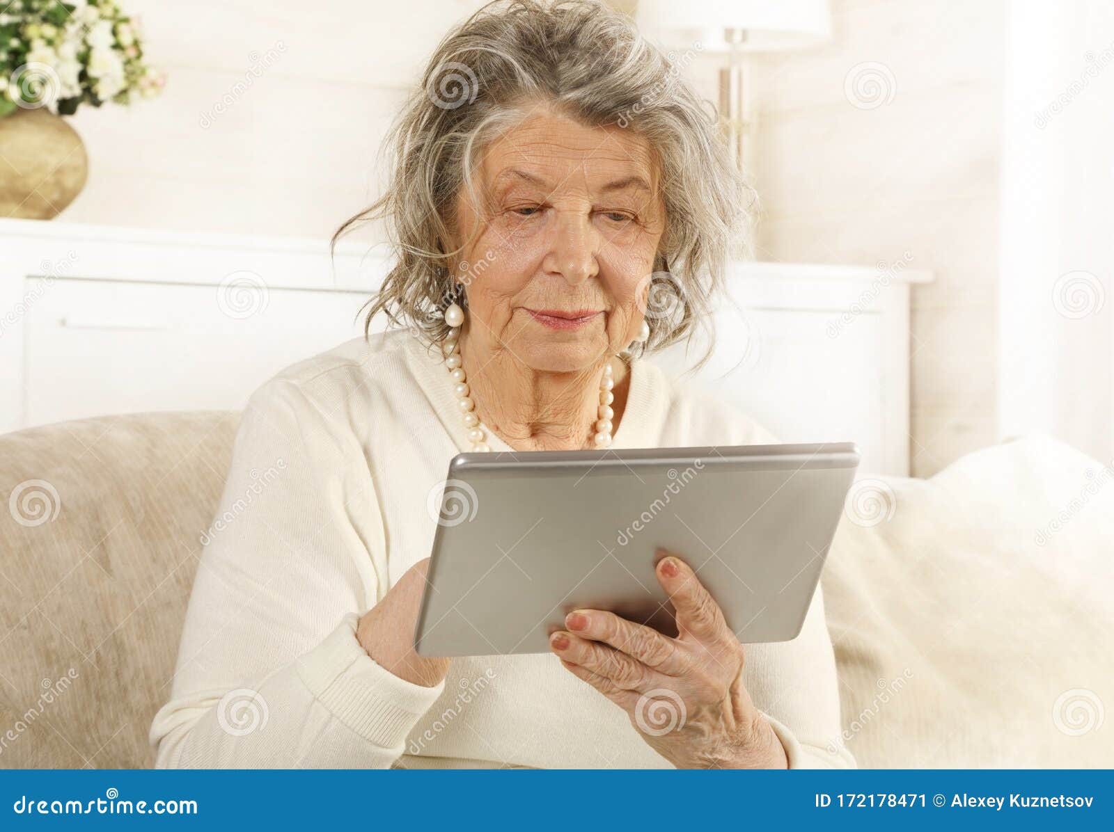 An Old Lady is Working with a Tablet Computer Stock Image - Image of ...