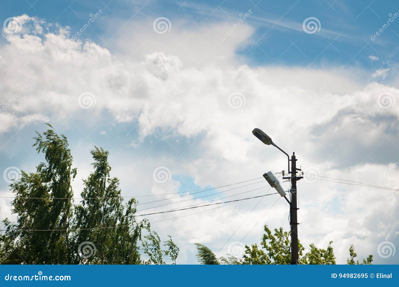 Old Lamp Post, Tree Foliage and Blue Sky with Clouds. Day Stock Image ...