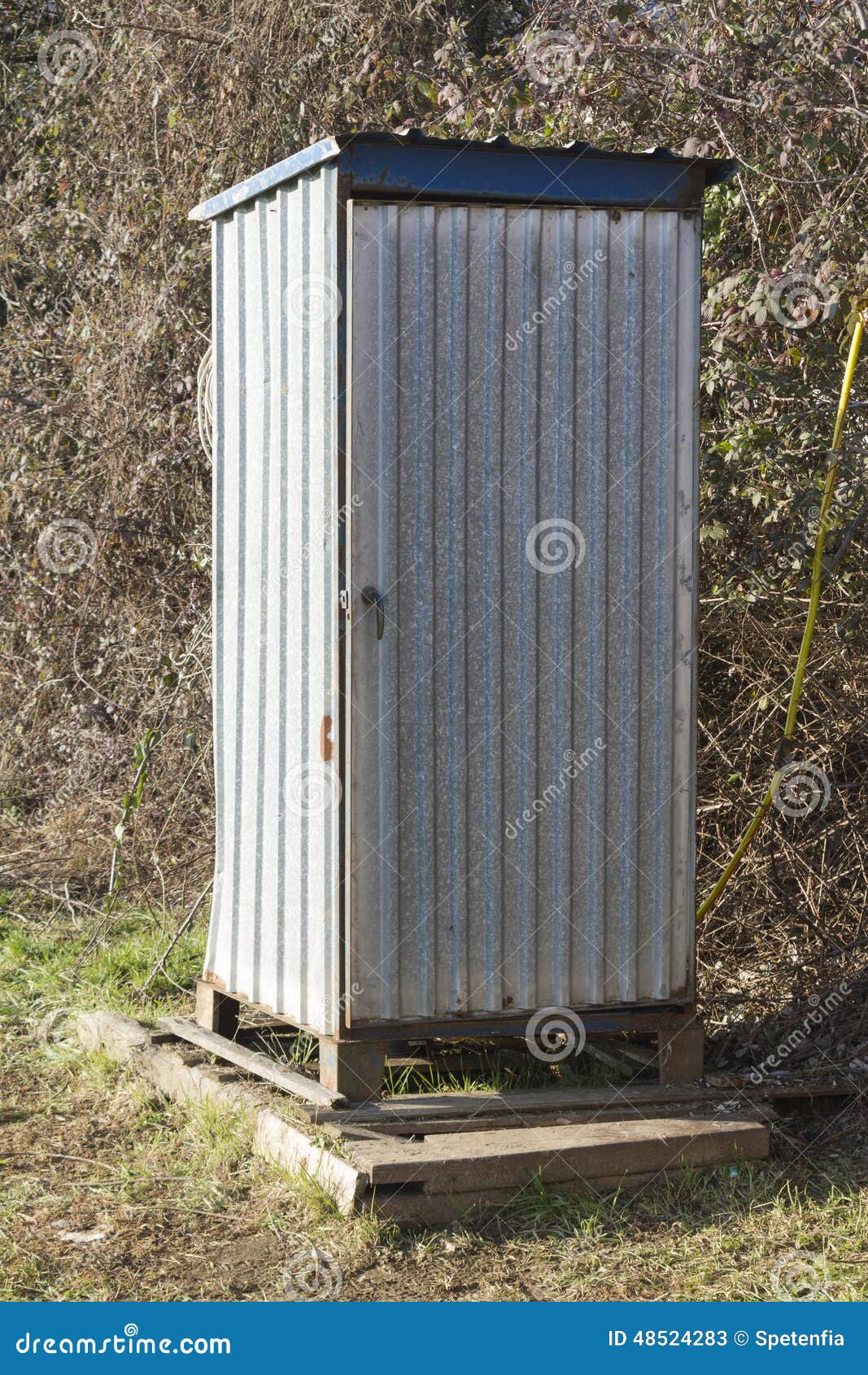 Old latrine in the meadow stock image. Image of latrine - 48524283