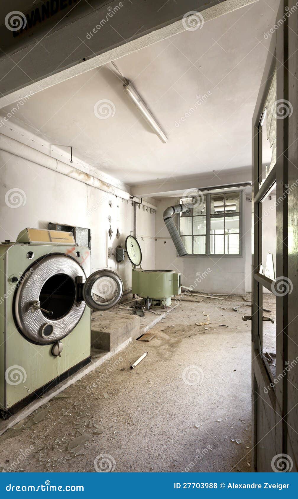 Creepy Old Laundry Room With A Dirty Floor And Broken Wash Machines And ...